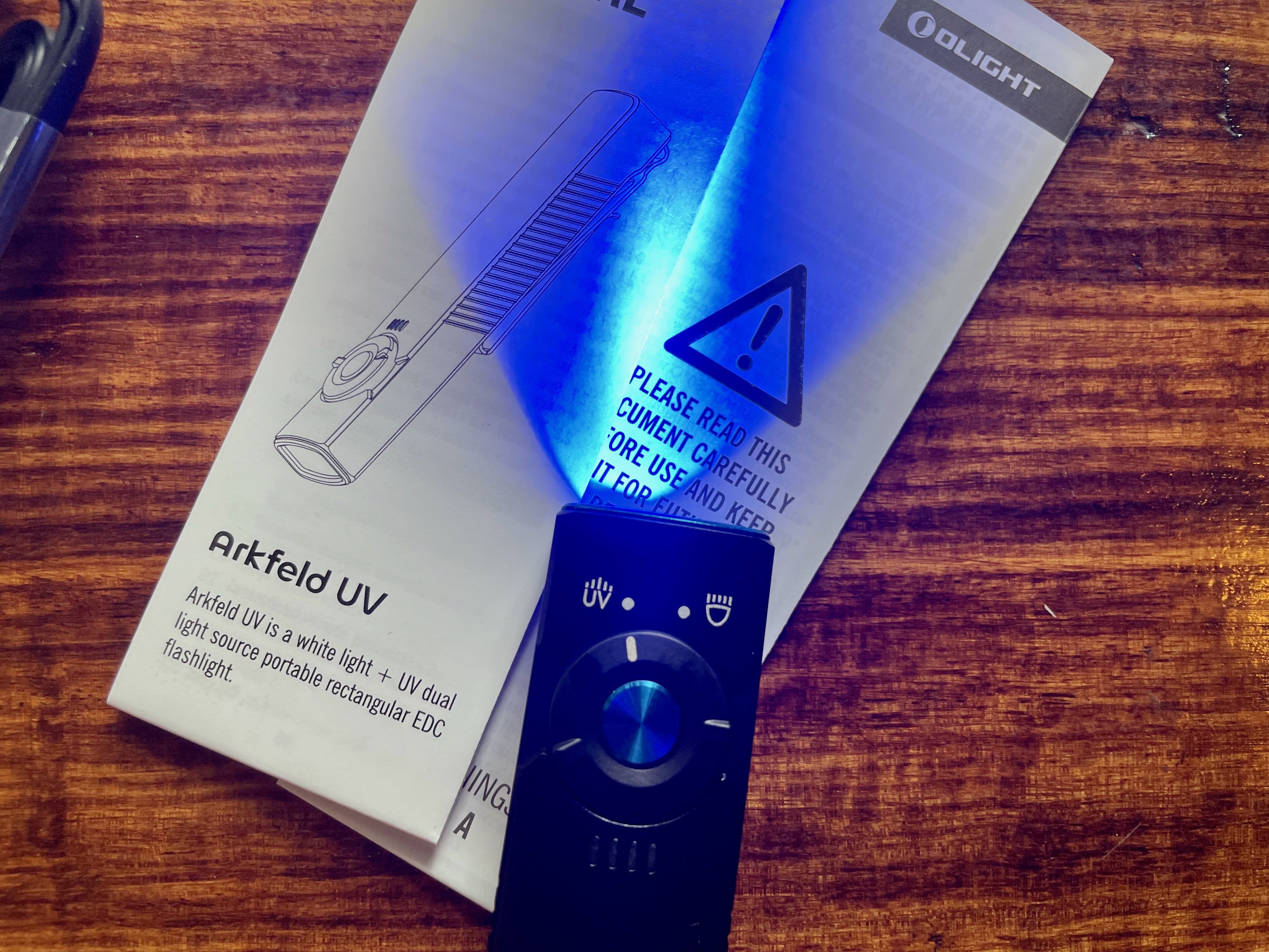 Olight Arkfeld UV Review: A Multipurpose EDC Flashlight - Outdoor ...